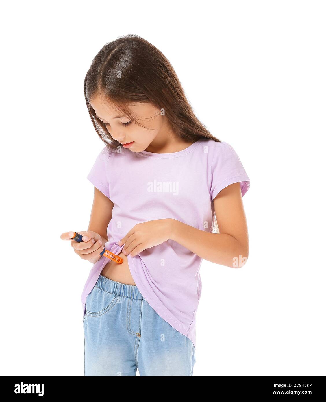 Little diabetic girl giving herself insulin injection on white ...