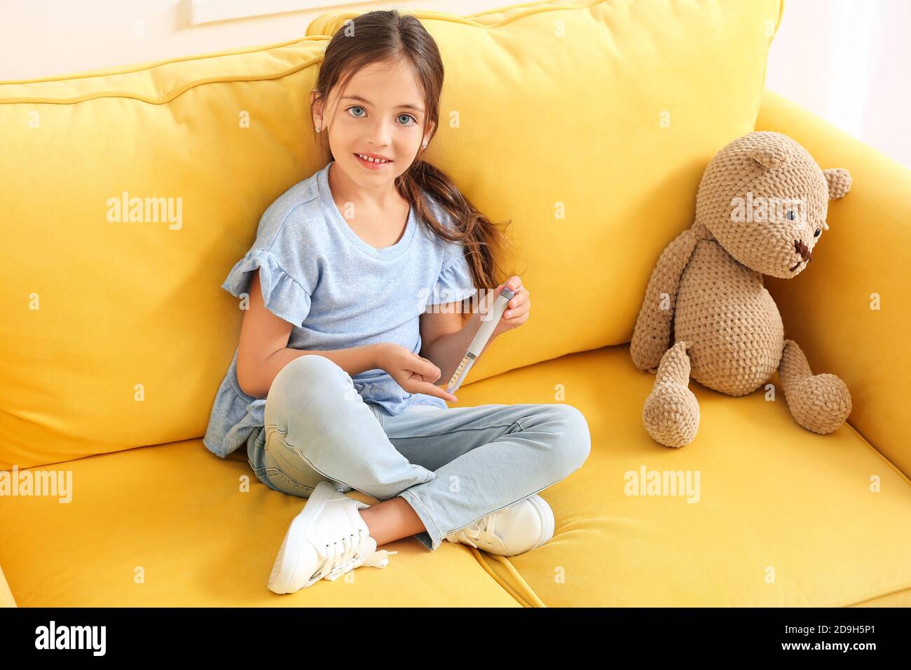 Little diabetic girl taking blood sample at home Stock Photo - Alamy