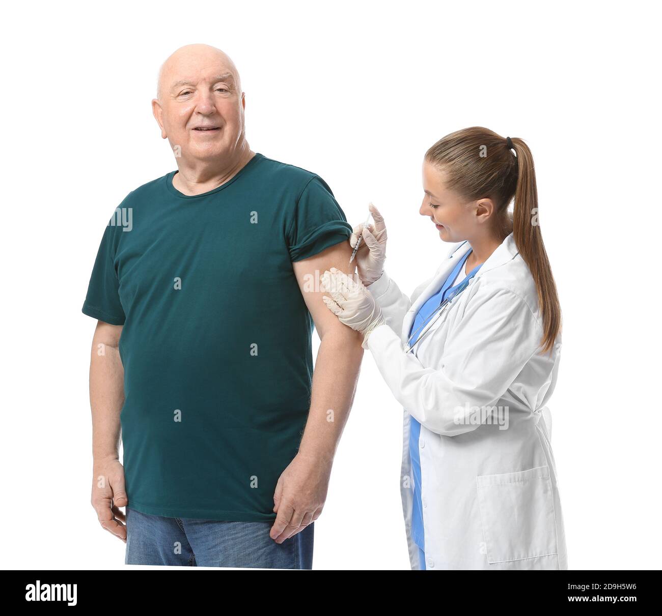 Woman giving medicine man Cut Out Stock Images & Pictures - Alamy