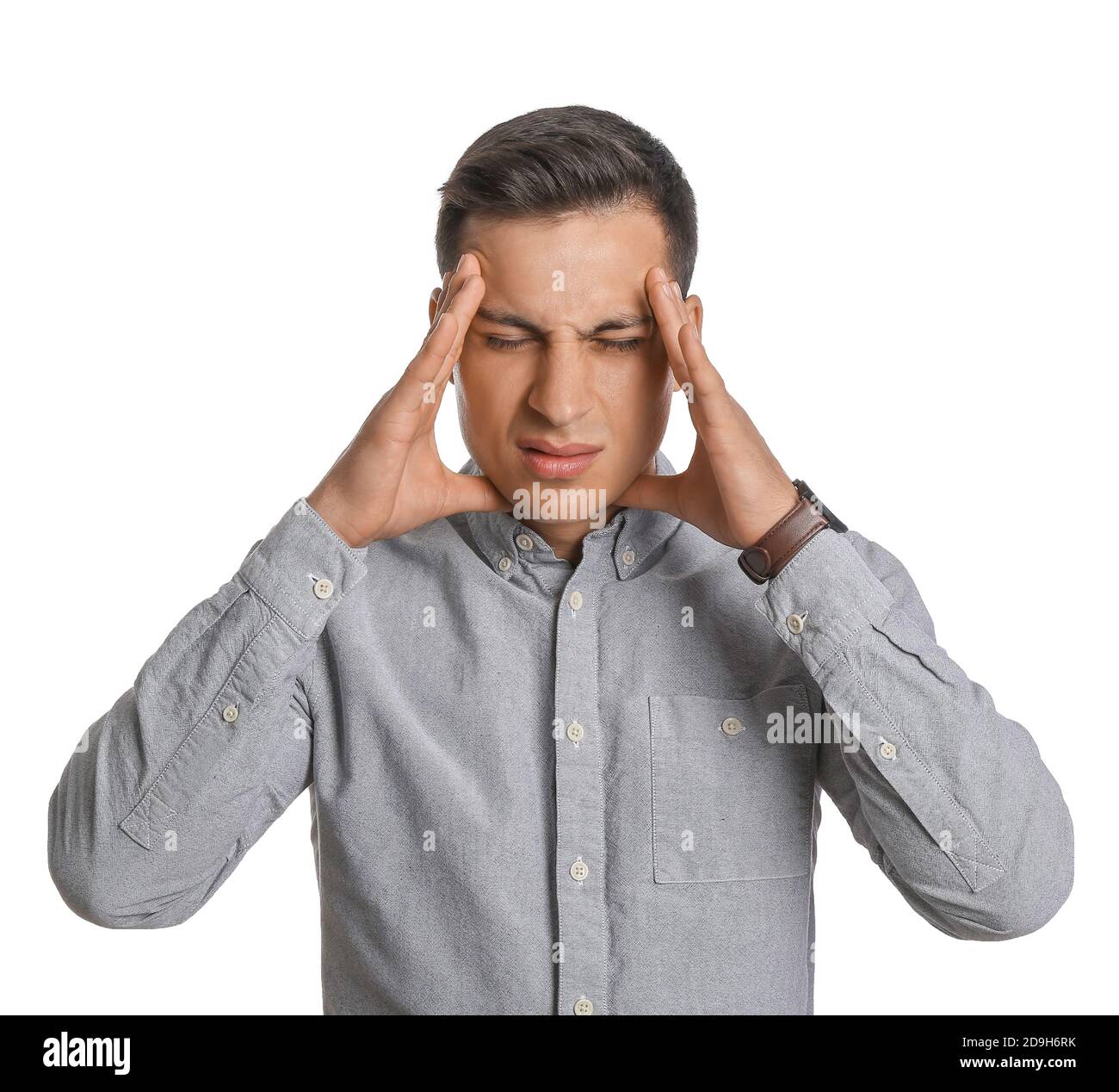 Stressed young man on white background Stock Photo - Alamy