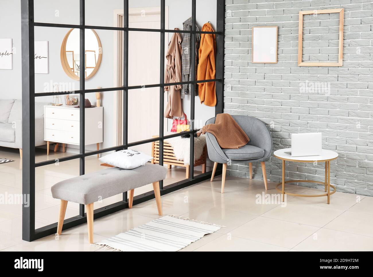 Stylish interior of modern hall in studio apartment Stock Photo - Alamy