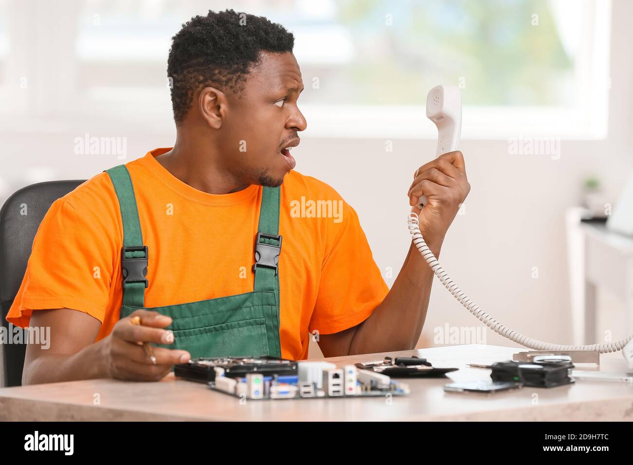 Crisis center office phone call hi-res stock photography and images - Alamy