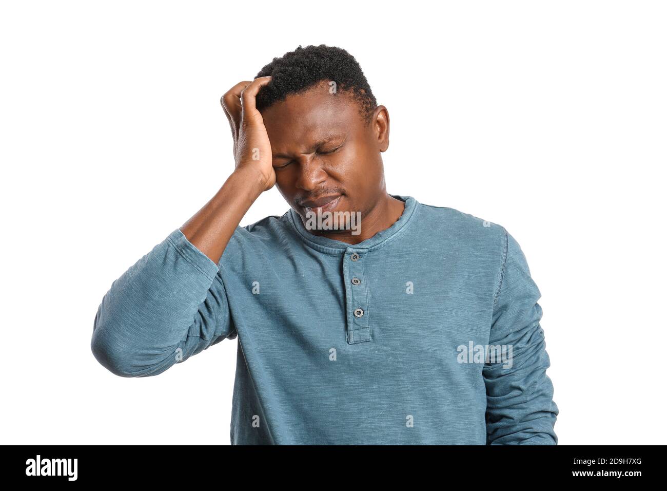 Stressed African-American man on white background Stock Photo - Alamy
