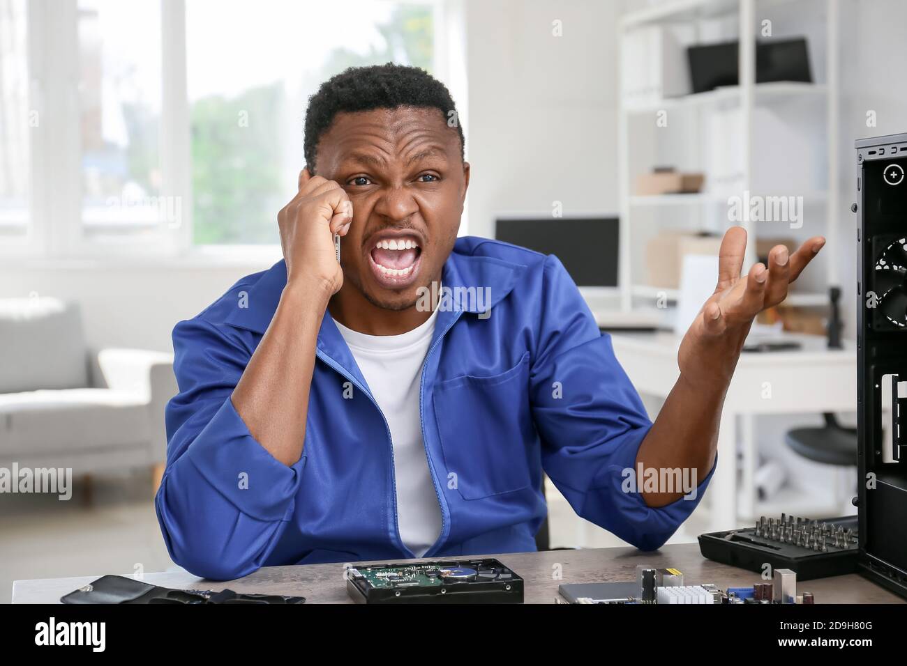 Person fixing computer angry hi-res stock photography and images - Alamy