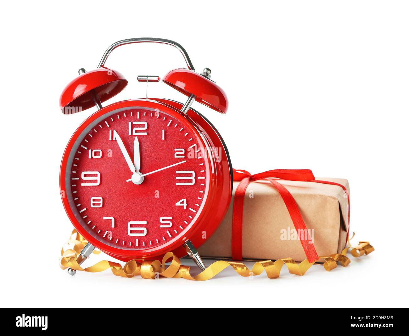 Alarm clock and Christmas gift isolated on white Stock Photo - Alamy