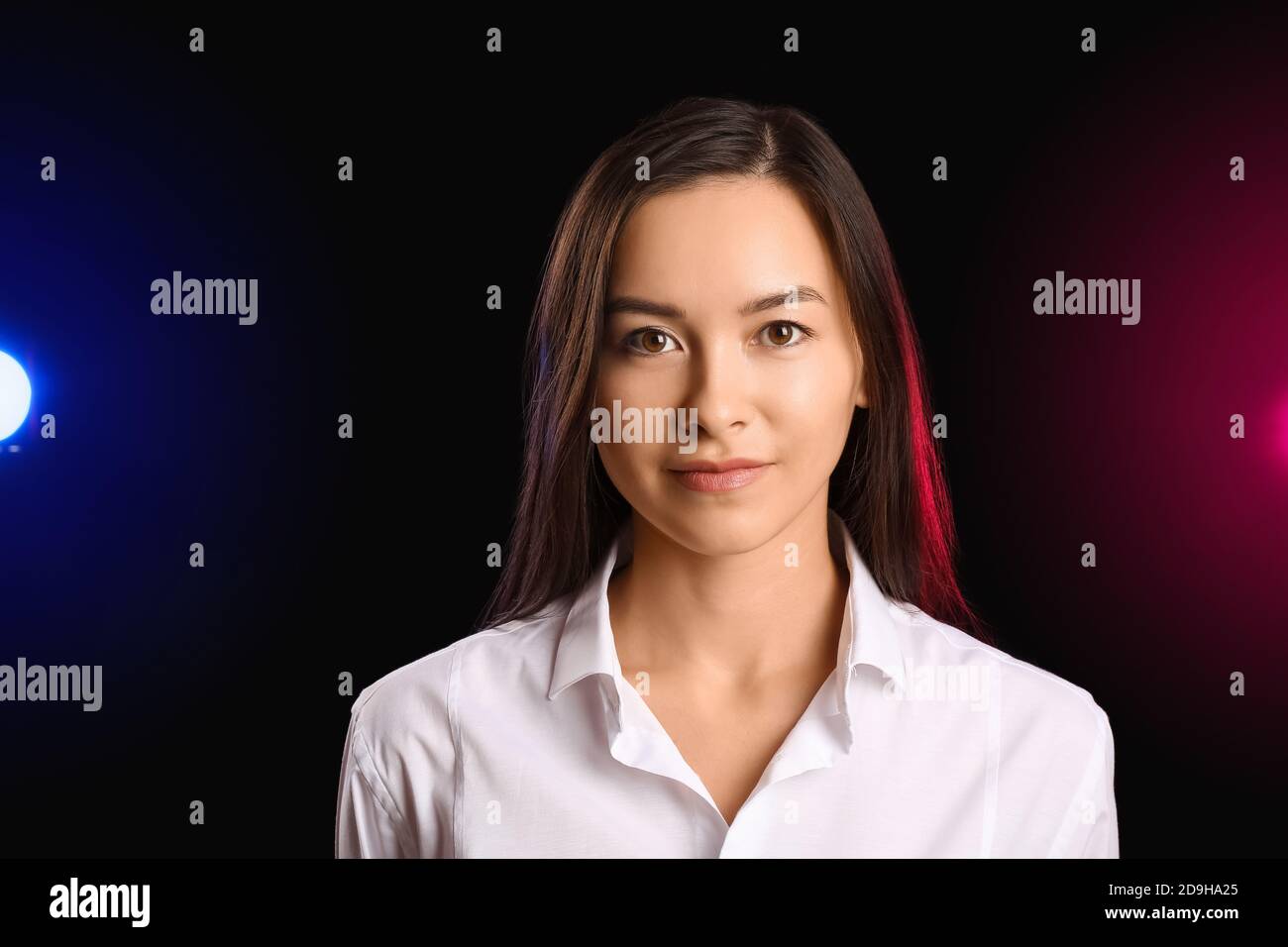 Young talented actress on dark background Stock Photo - Alamy