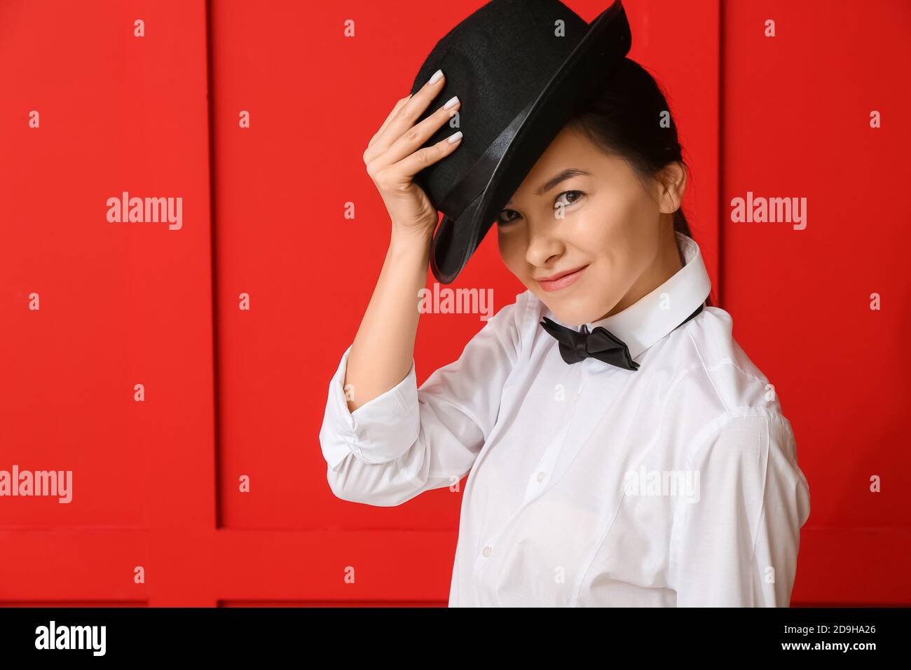 Young talented actress on color background Stock Photo - Alamy