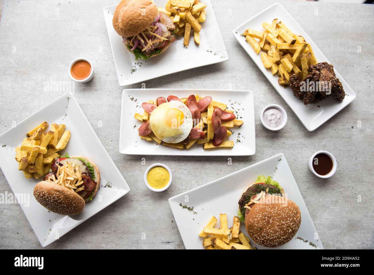 Salchipapas is a fast food dish from Latin America, sold in the streets ...