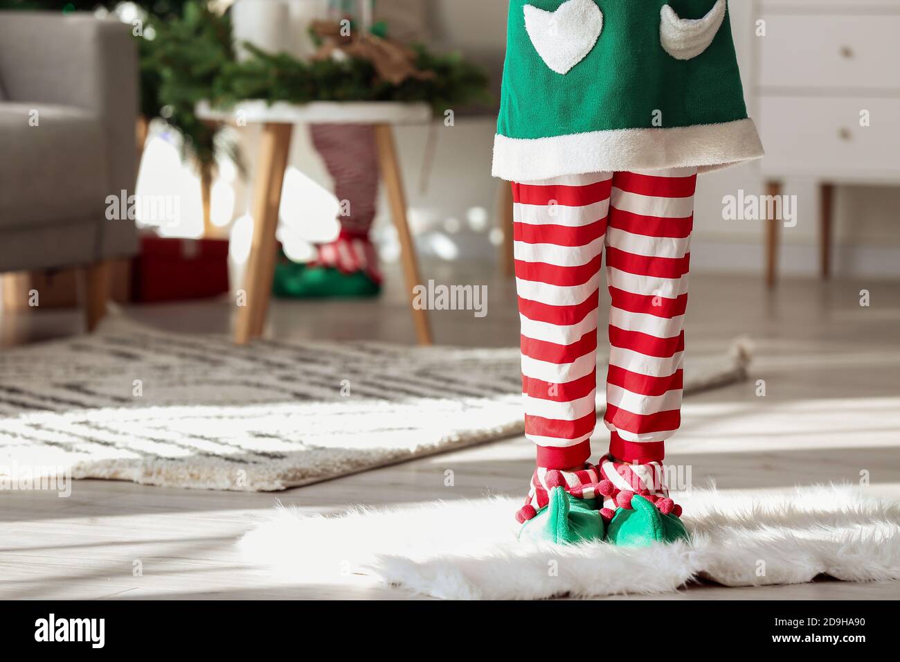 Cute little elf at home on Christmas eve Stock Photo - Alamy