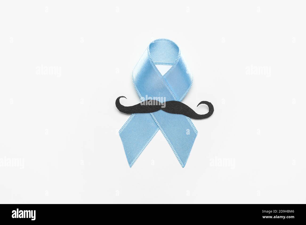 Blue ribbon and mustache on white background. Prostate cancer awareness ...