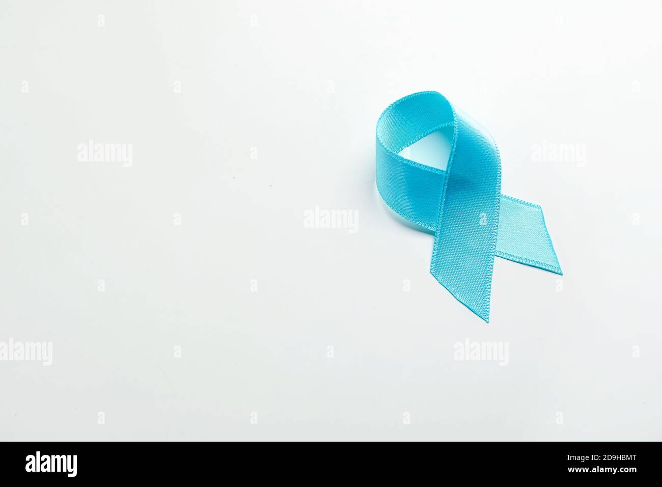 Blue ribbon on white background. Prostate cancer awareness concept ...