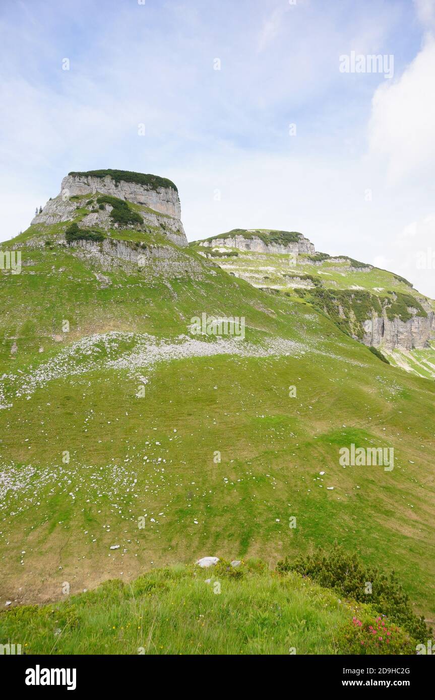 Vertical shot of beautiful Austrian hills under the cloudy sky Stock ...