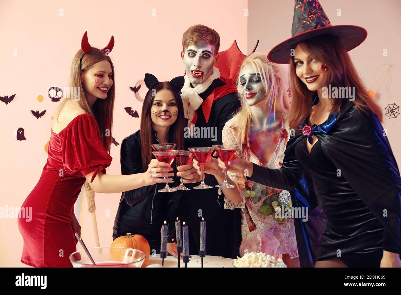 Friends celebrating Halloween at the party Stock Photo - Alamy