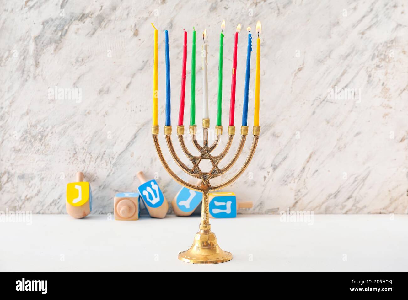 Menorah for Hanukkah on white background Stock Photo - Alamy
