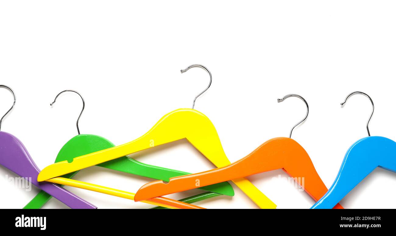 Clothes hangers on white background Stock Photo - Alamy