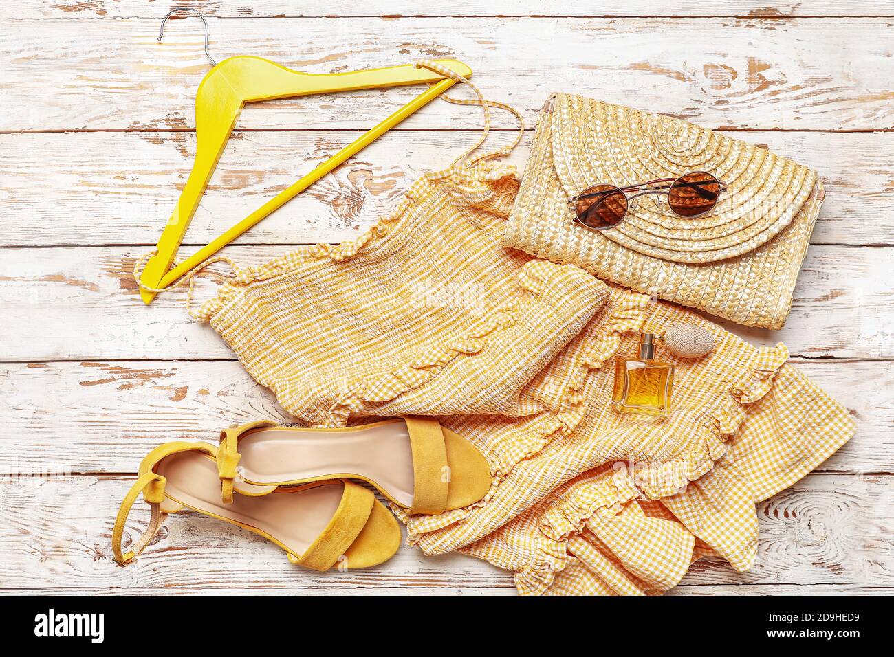 Composition with modern clothes and accessories on wooden background ...