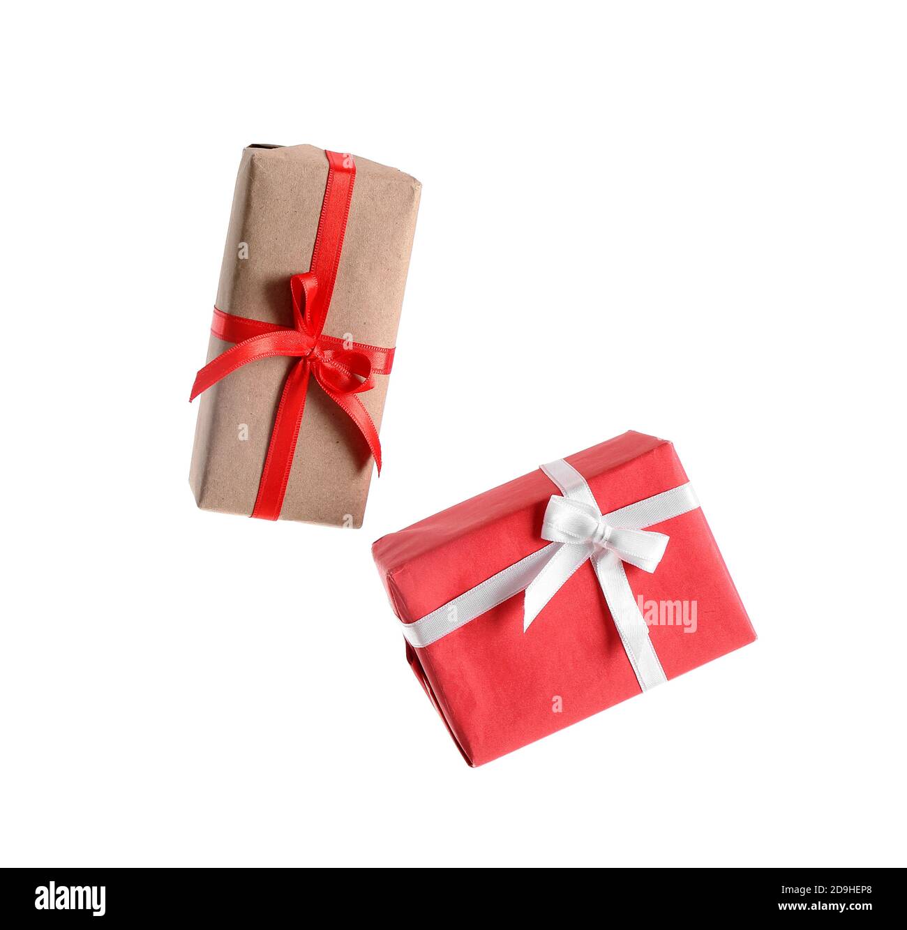 Flying gift boxes on white background Stock Photo - Alamy