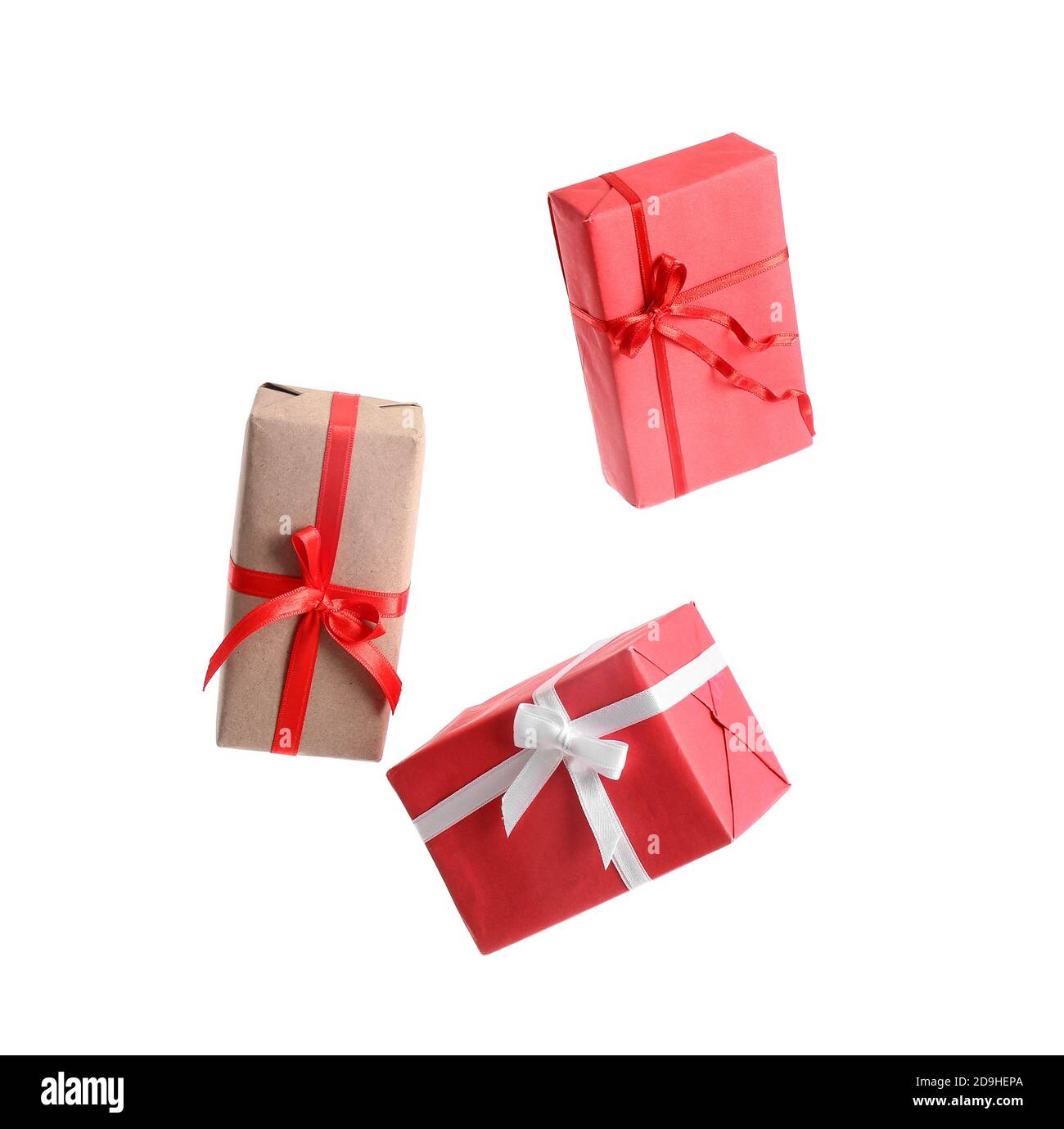 Flying gift boxes on white background Stock Photo - Alamy