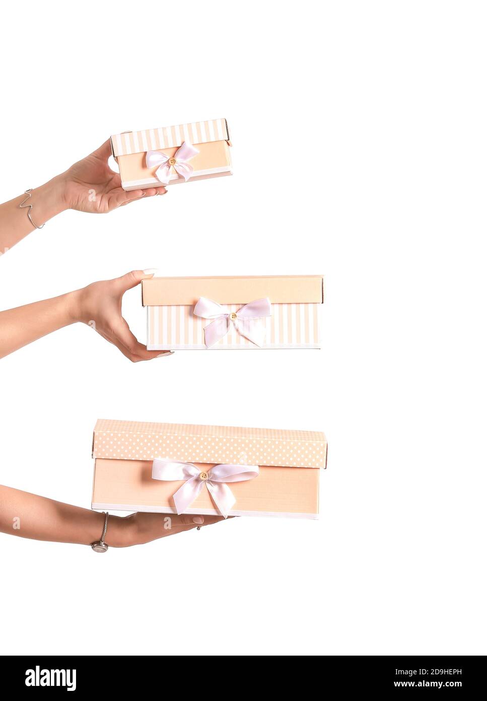 Hands with gift boxes on white background Stock Photo - Alamy