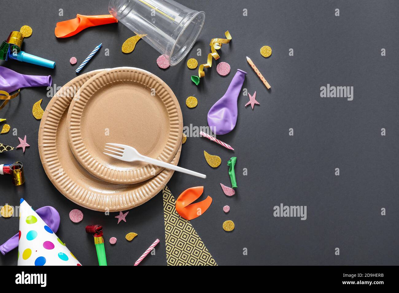 Mess after party celebration on dark background Stock Photo - Alamy