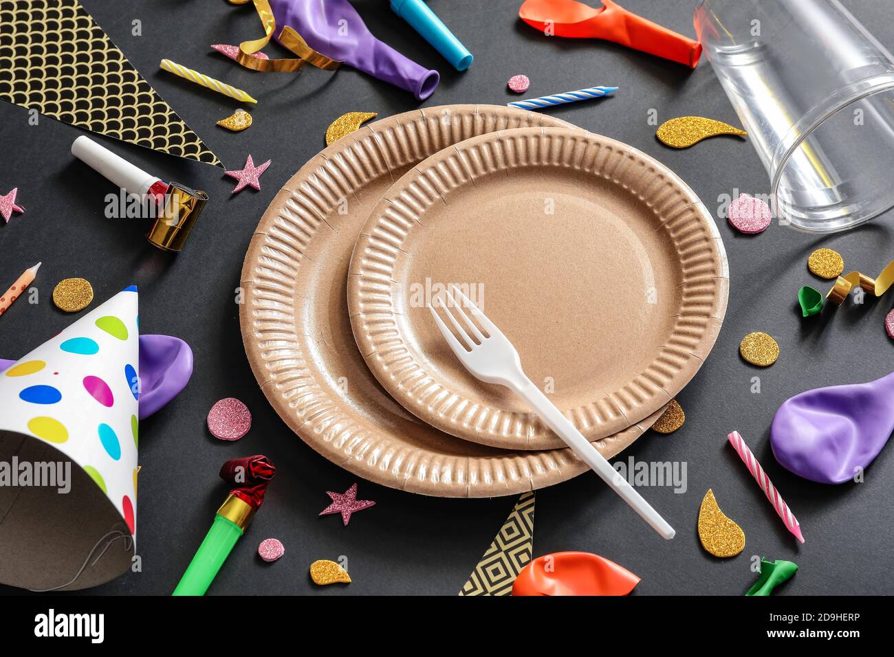 Mess after party celebration on dark background Stock Photo - Alamy