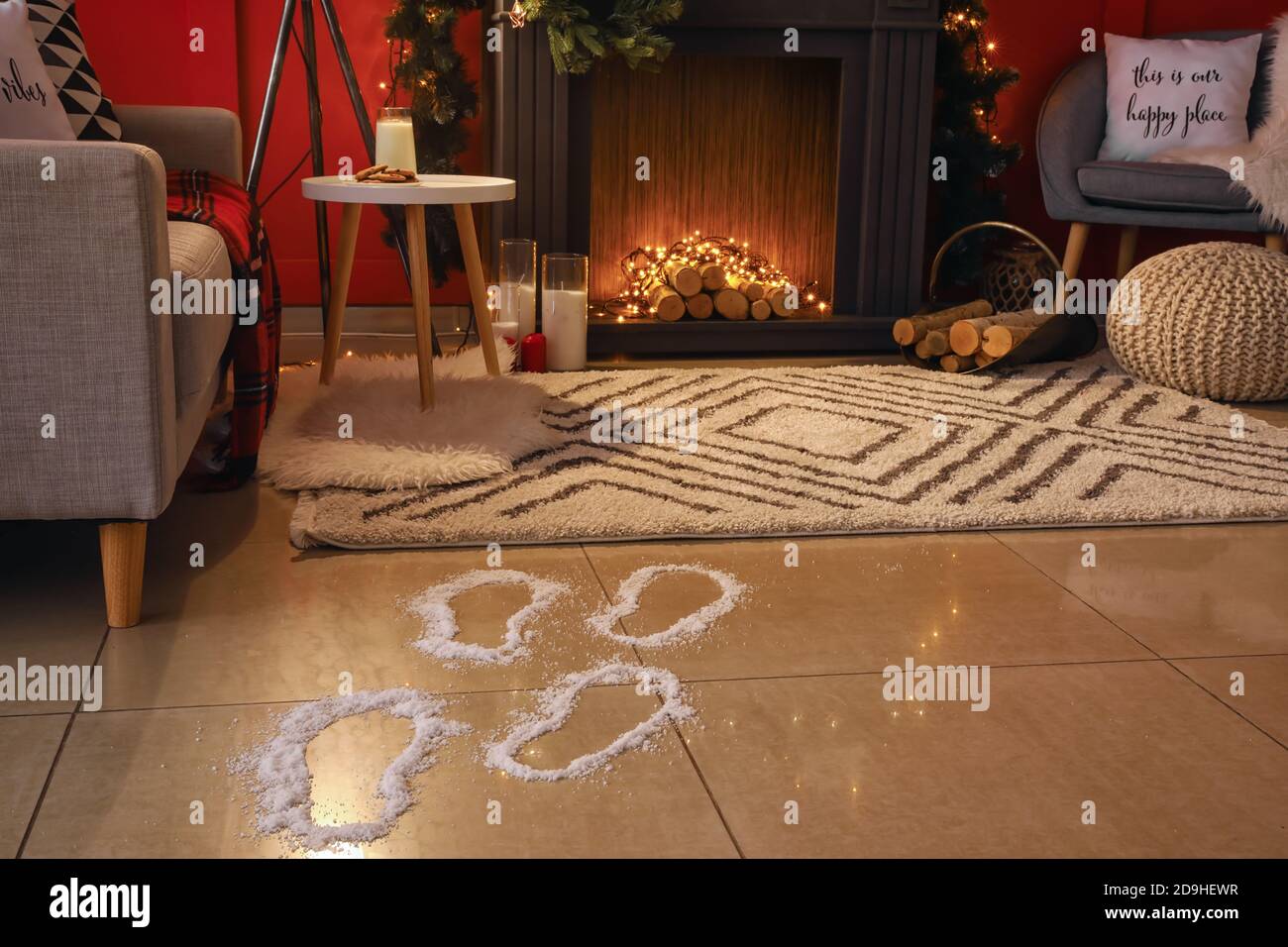 Footprints of Santa on floor in room decorated for Christmas Stock ...