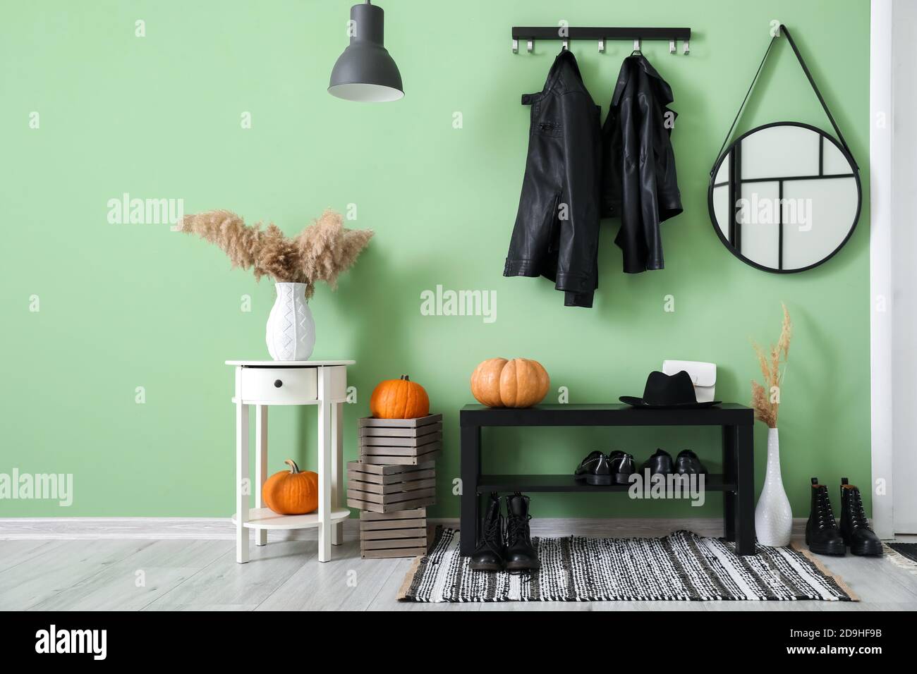 Stylish interior of modern hall with autumn decor Stock Photo - Alamy