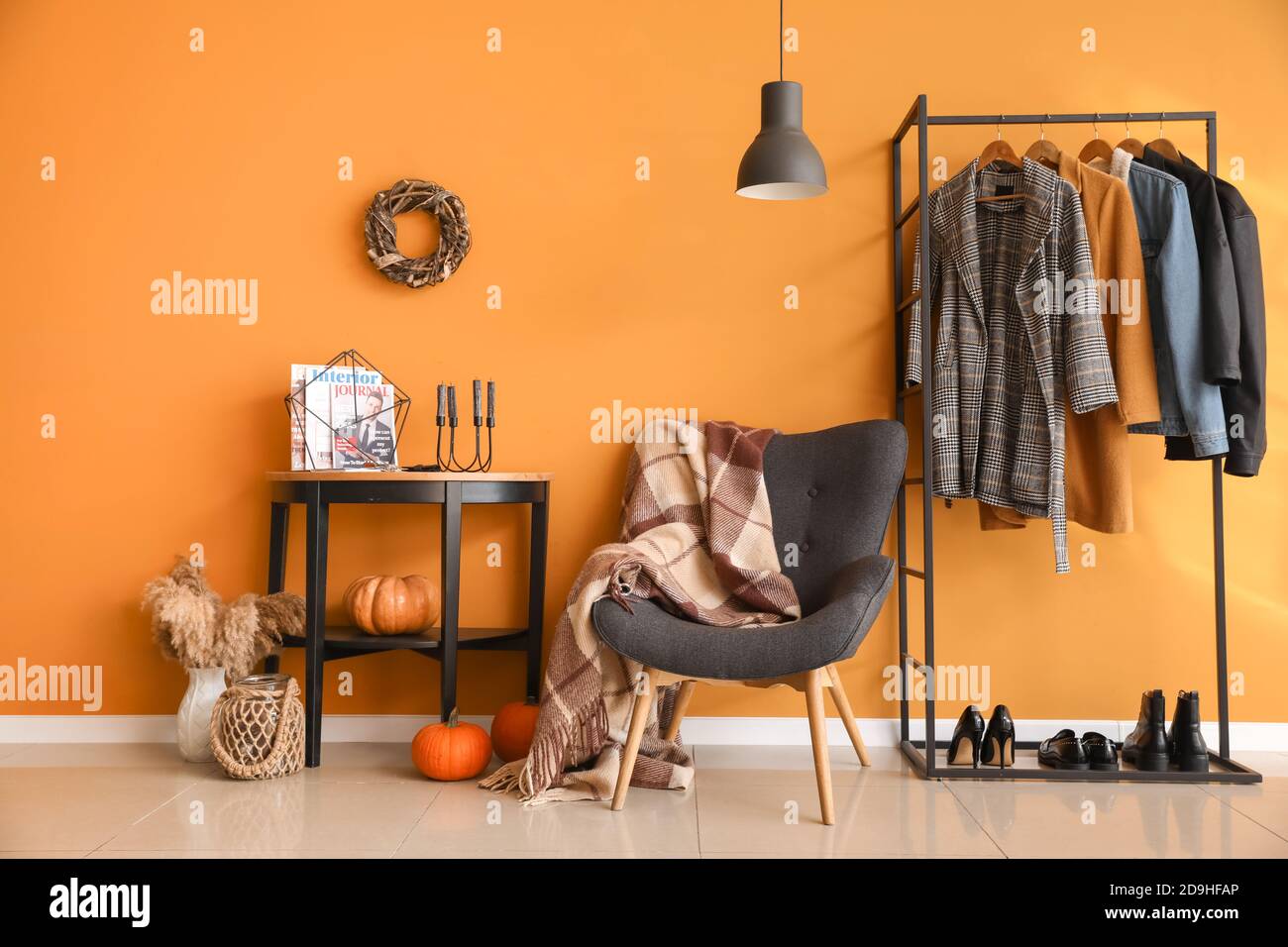 Stylish interior of modern hall with autumn decor Stock Photo - Alamy