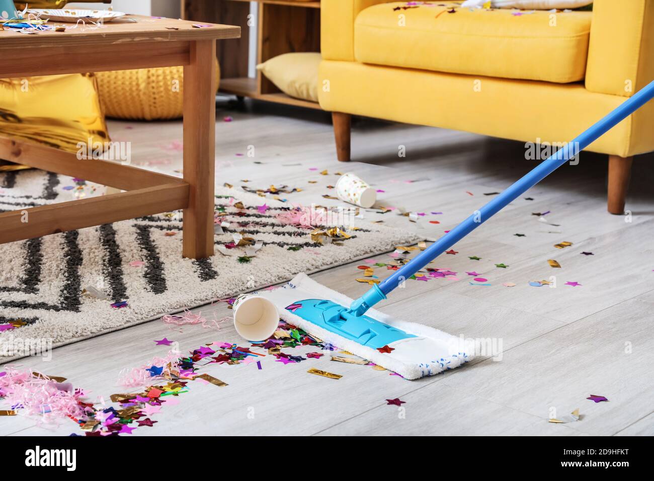 Cleaning of messy room after party celebration Stock Photo - Alamy