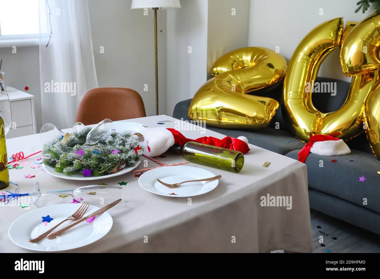 Interior of messy room after New Year party Stock Photo - Alamy