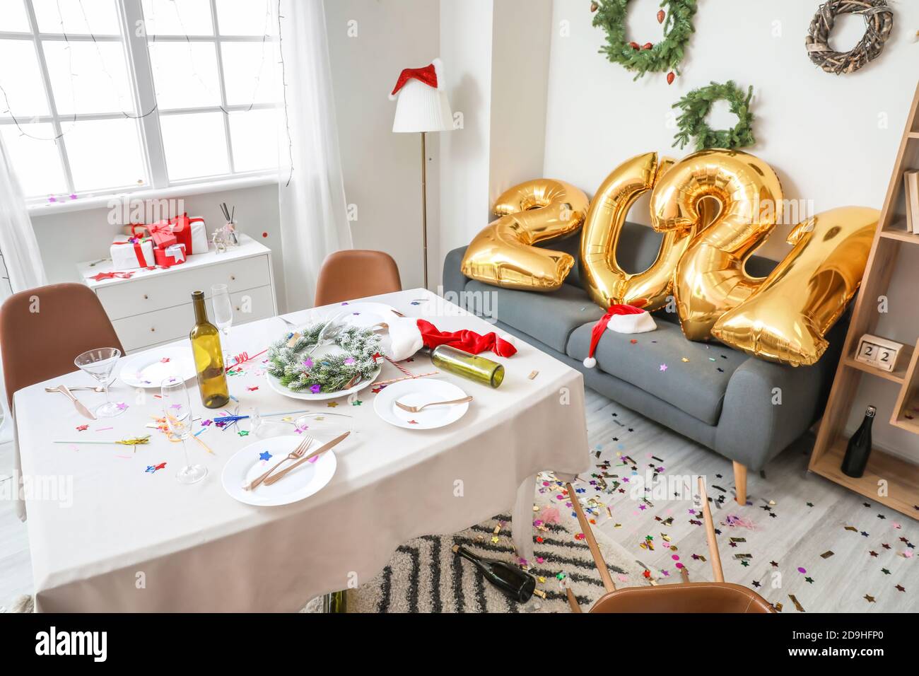 Interior of messy room after New Year party Stock Photo - Alamy