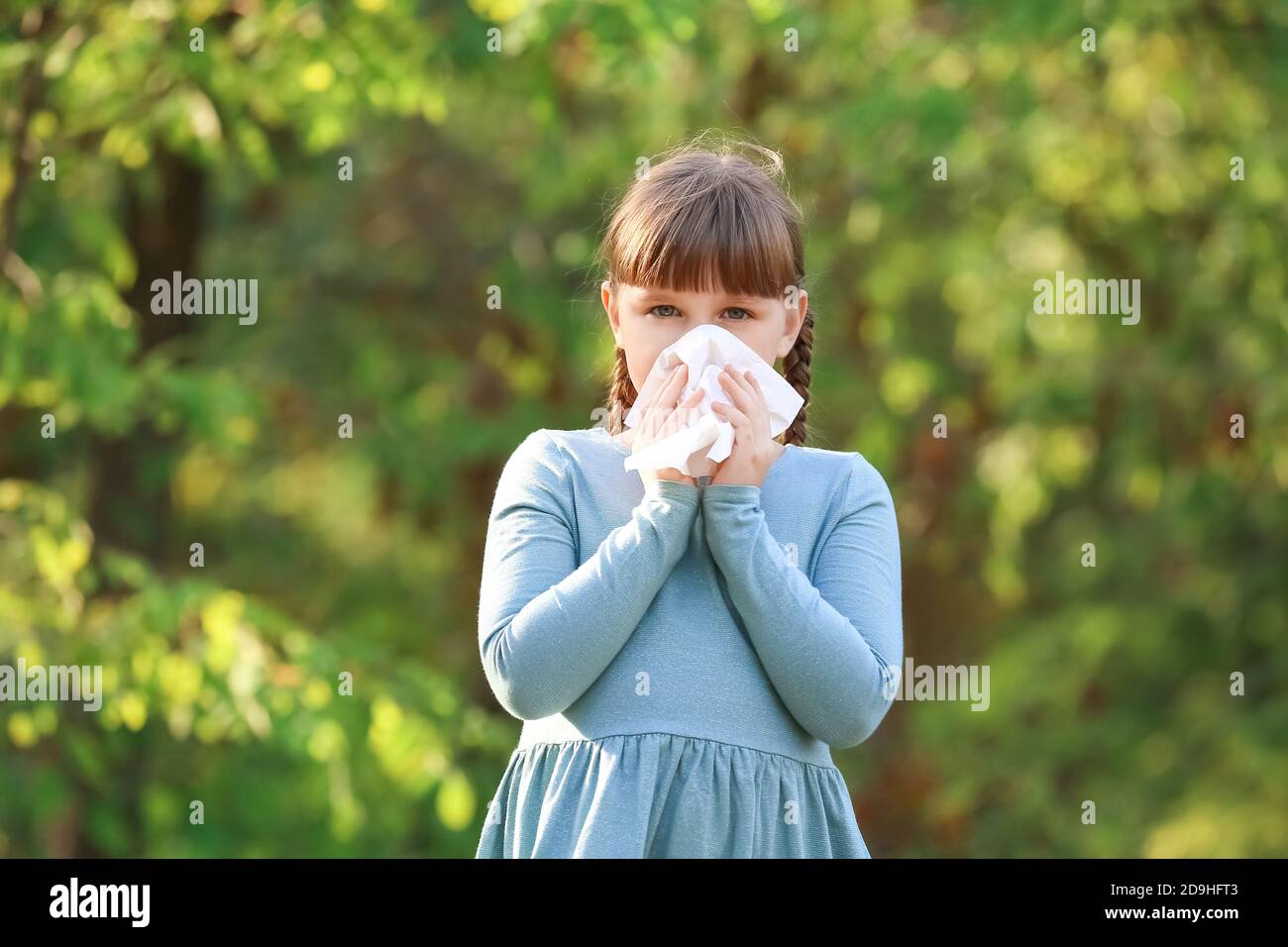 Little girl suffering from allergy outdoors Stock Photo - Alamy