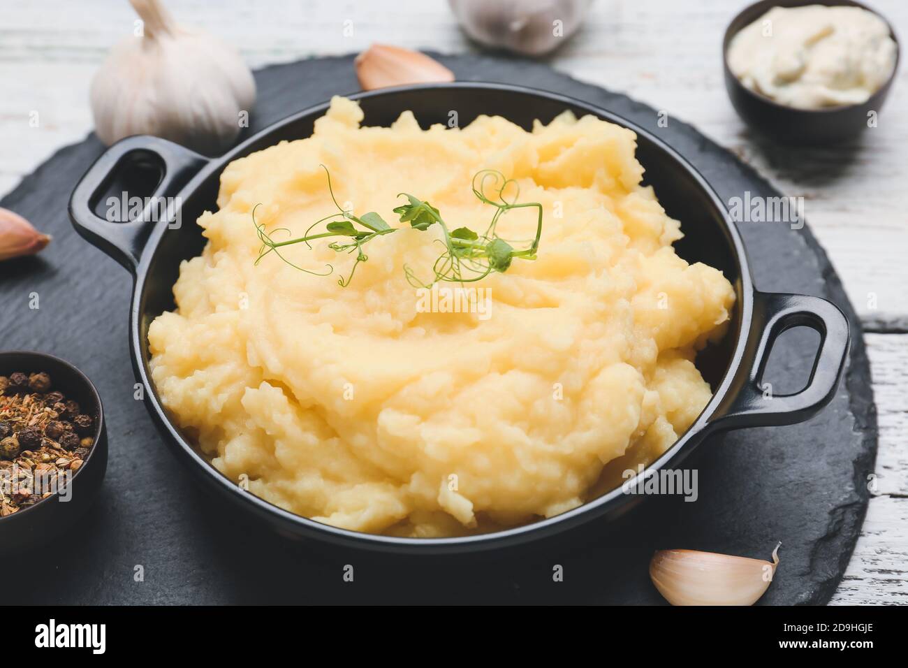 Pan with tasty mashed potato on table Stock Photo - Alamy