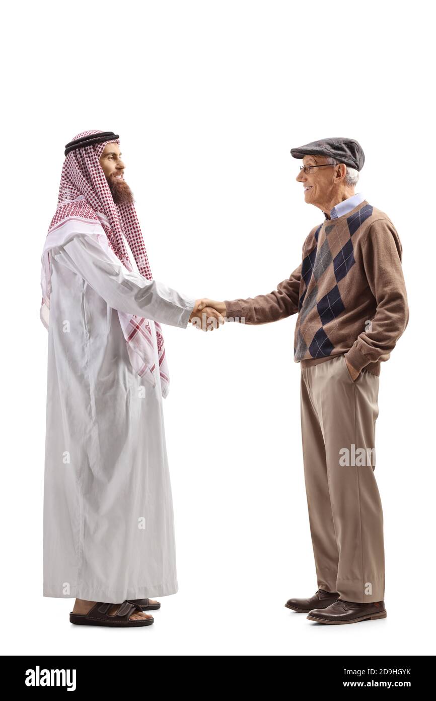 Full length profile shot of a saudi arab man shaking hands with an ...