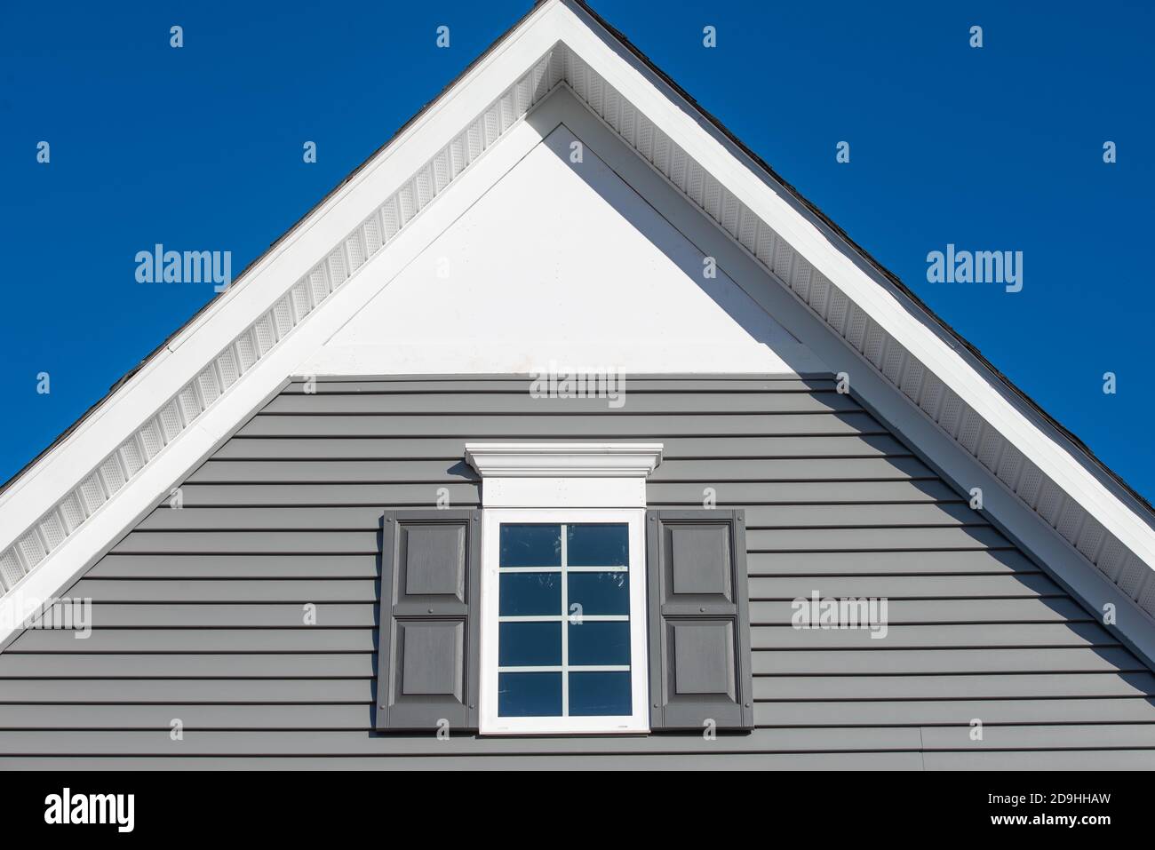 Various roof gable with horizontal vinyl fish with blue neutral ...