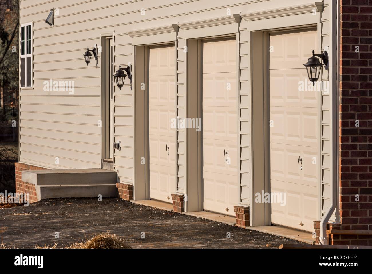 Close up of light maple or desert tan triple single car insulated steel ...