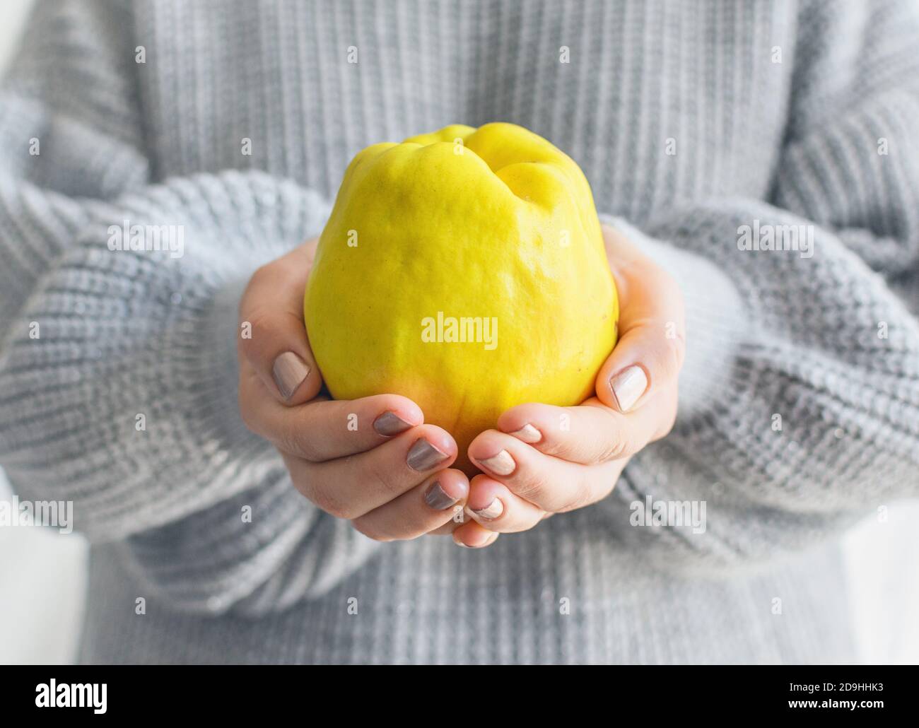 Holding quince hi-res stock photography and images - Alamy