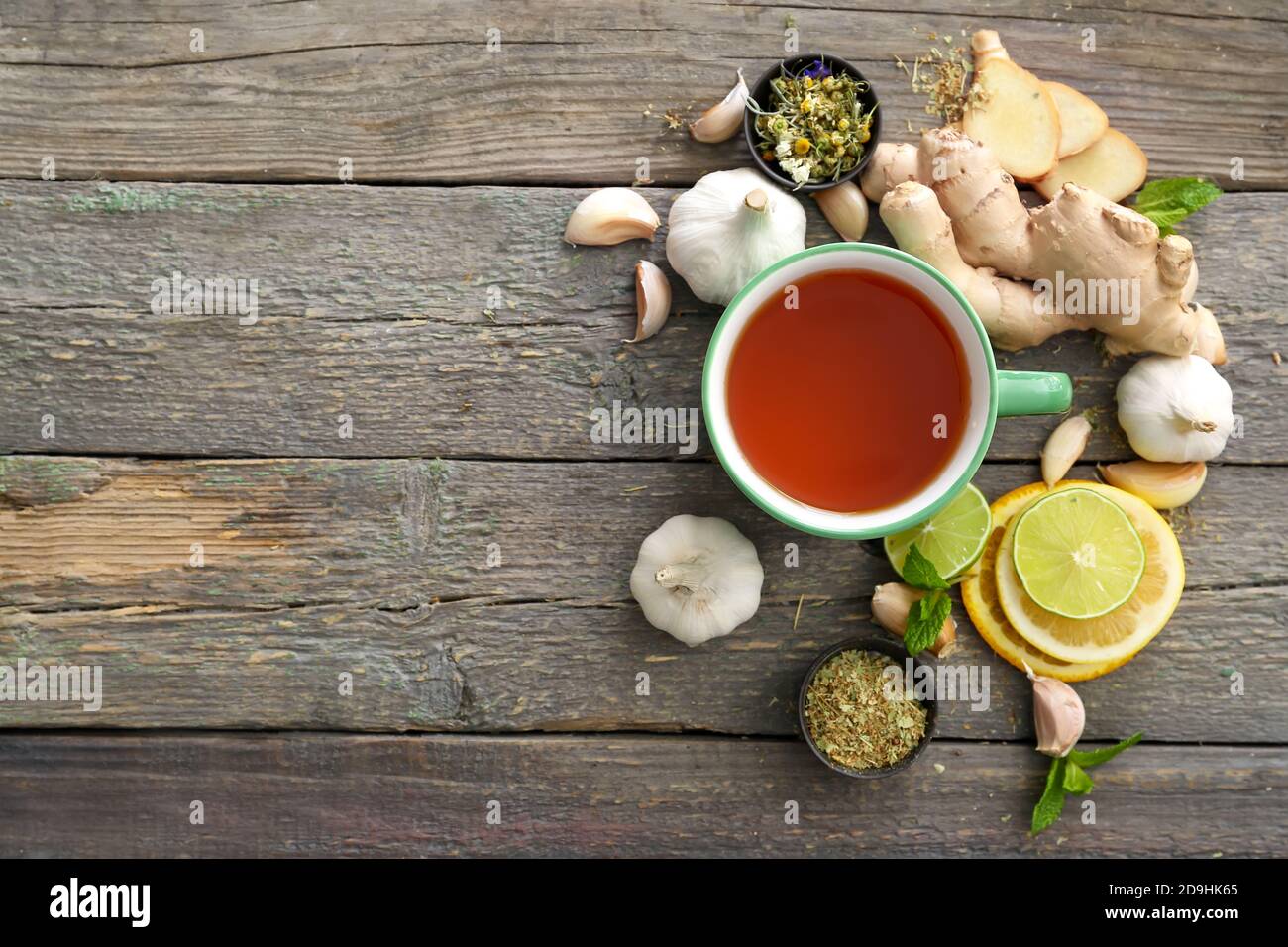 Cup of healthy garlic tea on table Stock Photo - Alamy