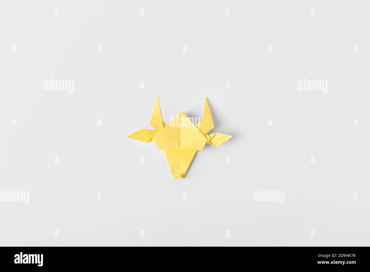 Origami bull as symbol of year 2021 on white background Stock Photo - Alamy