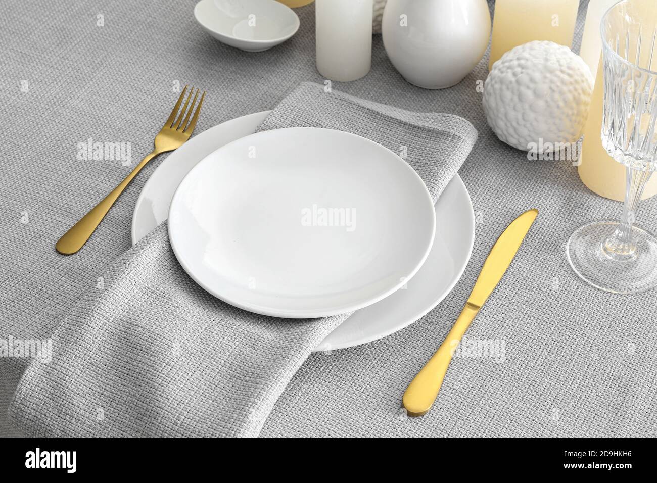 Beautiful table setting on light background Stock Photo - Alamy