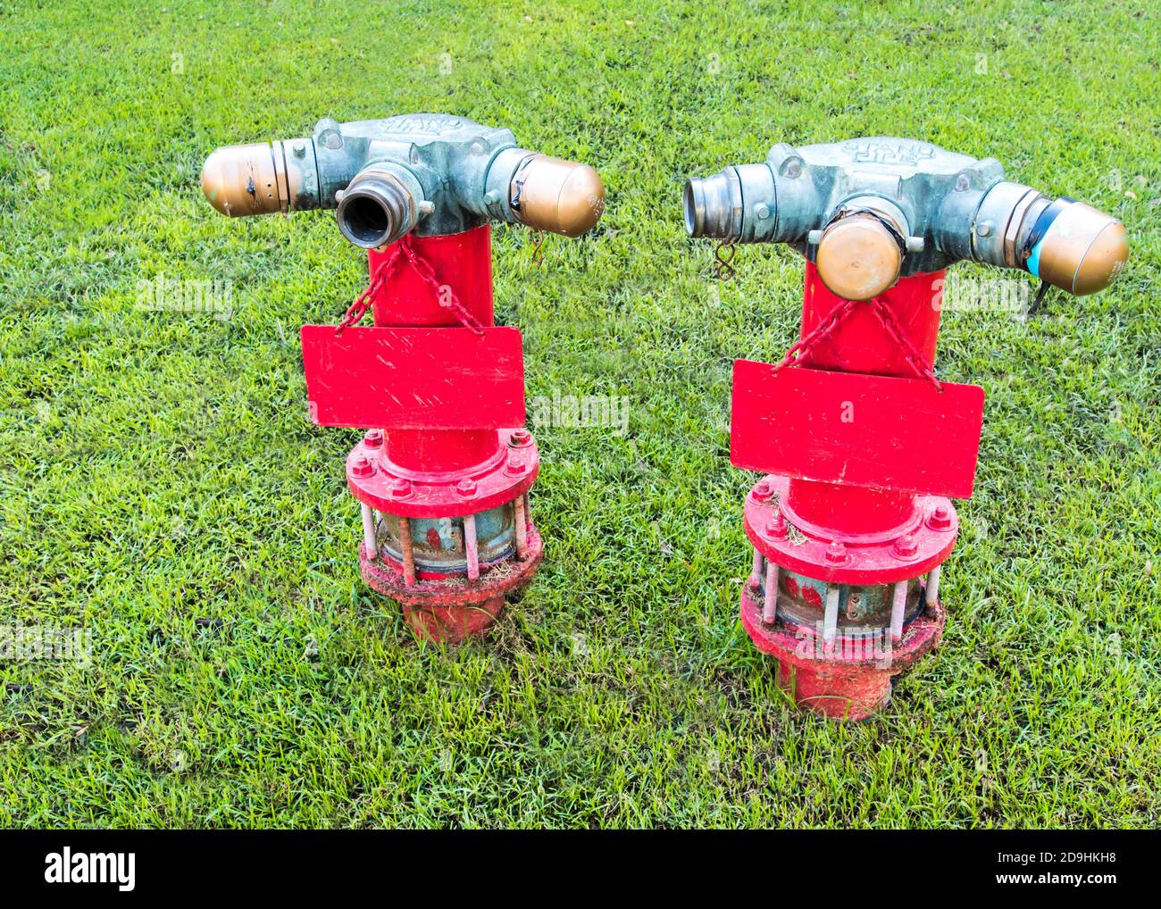 Nozzle for Firefighting On the wet lawn Stock Photo - Alamy