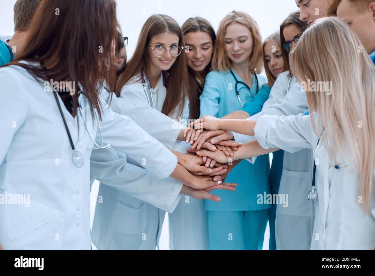 top view. a group of smiling doctors pointing at you Stock Photo - Alamy