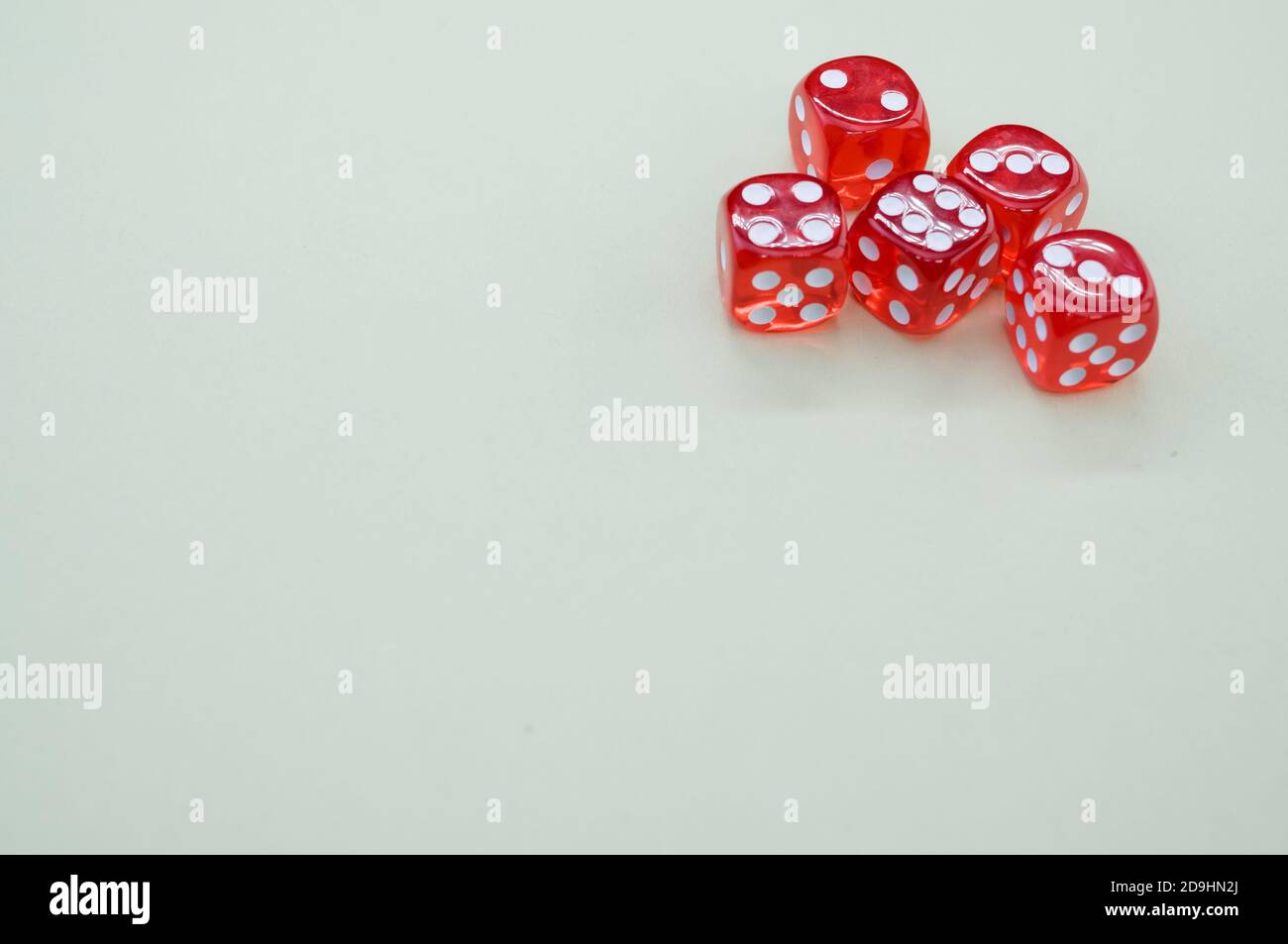 High angle shot of playing dice on an isolated gray background Stock ...
