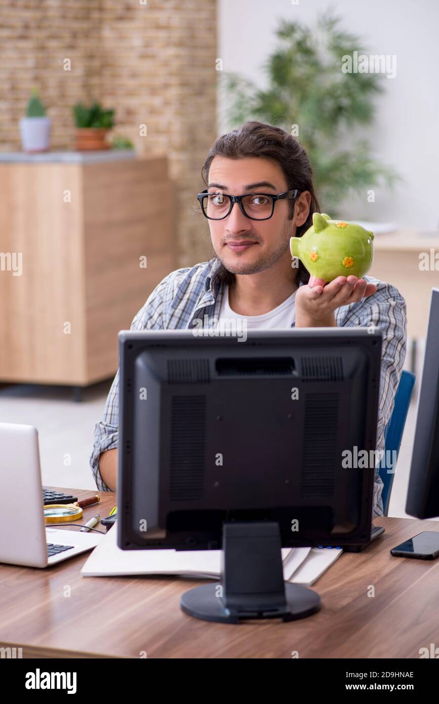 Male it specialist working in the office Stock Photo - Alamy