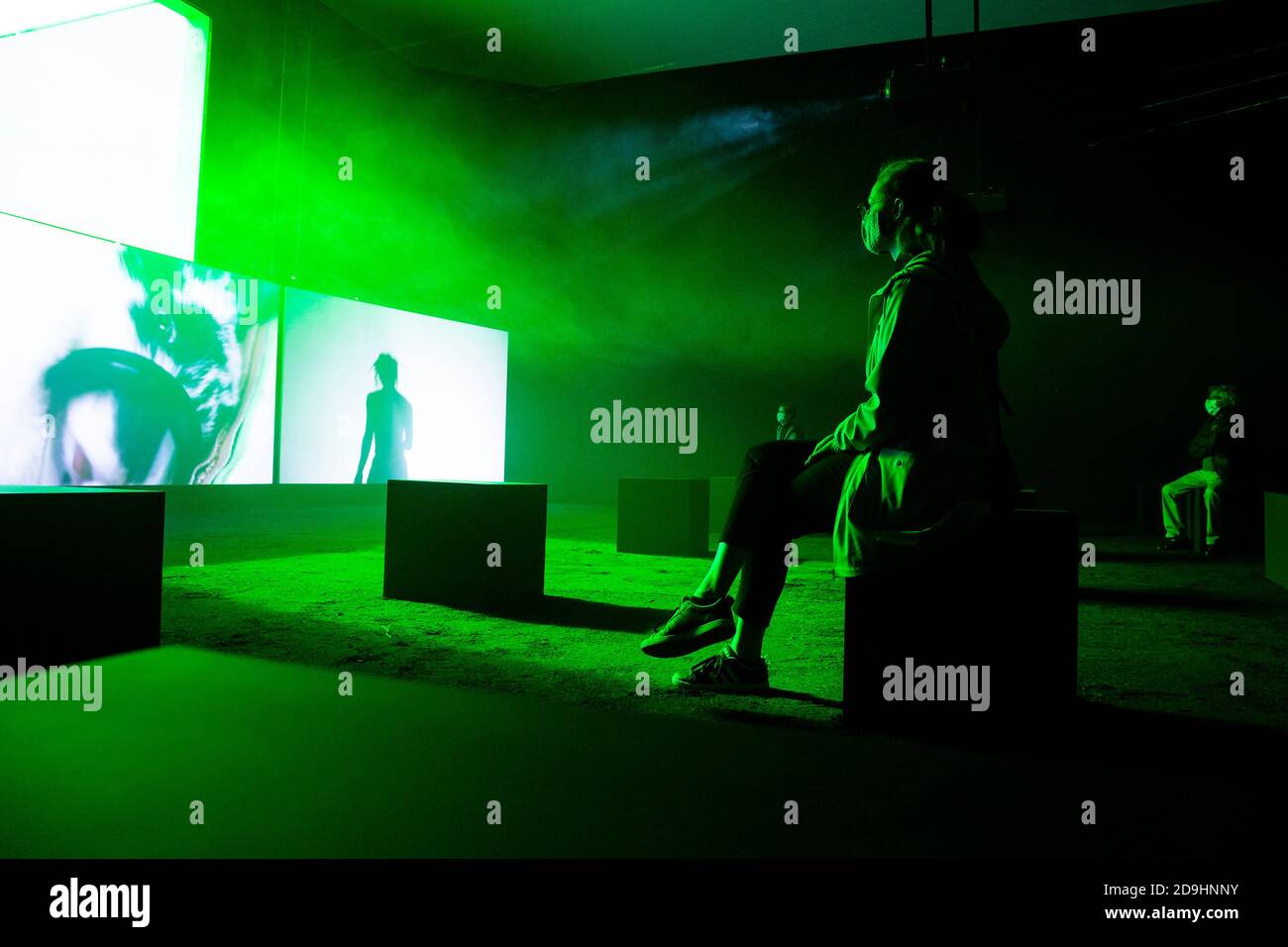 People watching performance in museum hi-res stock photography and ...
