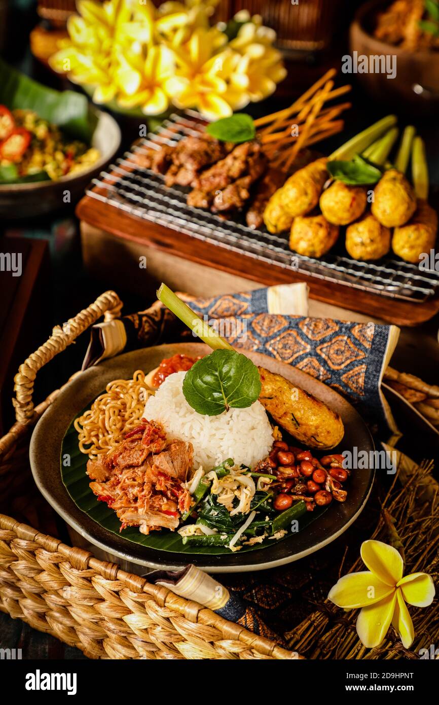 Nasi Campur Bali. Balinese meal of rice with shredded chicken ...