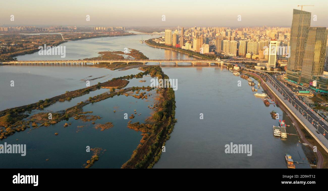 An aerial view of vehicles moving on the Songhua River Highway Bridge ...