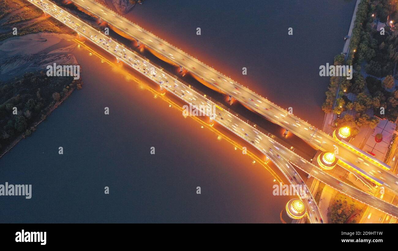 An aerial view of vehicles moving on the Songhua River Highway Bridge ...