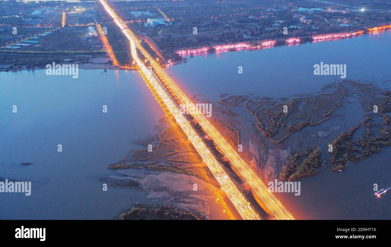 An aerial view of vehicles moving on the Songhua River Highway Bridge ...