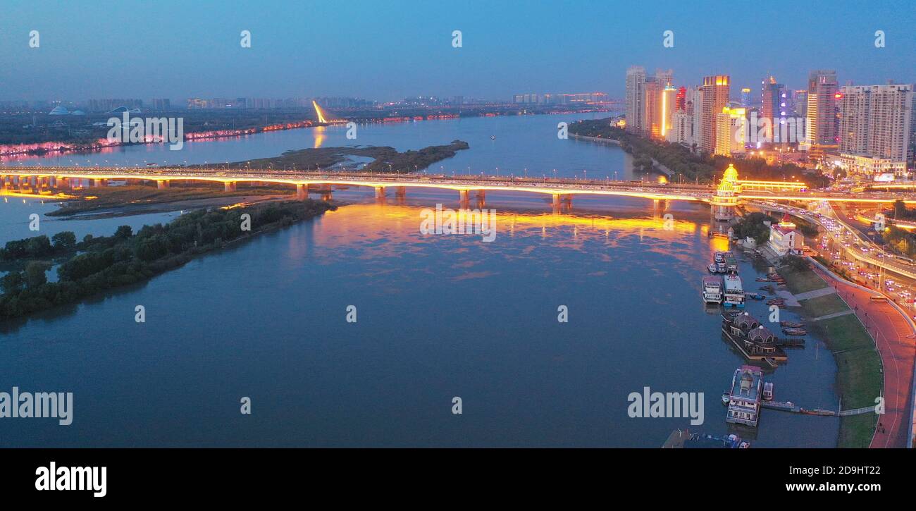 An aerial view of vehicles moving on the Songhua River Highway Bridge ...